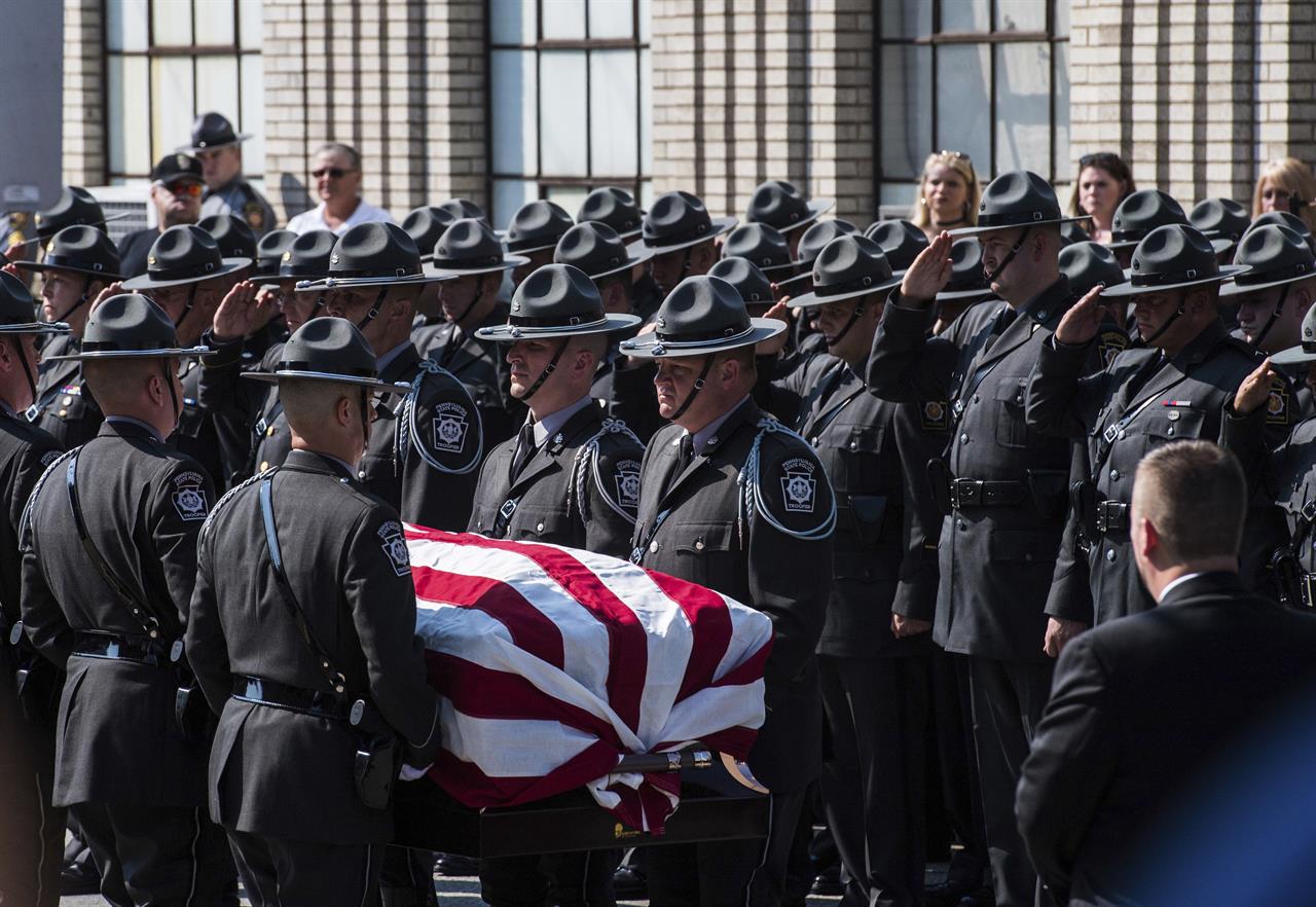 Hundreds of officers at funeral for trooper killed in wreck - Seattle, WA