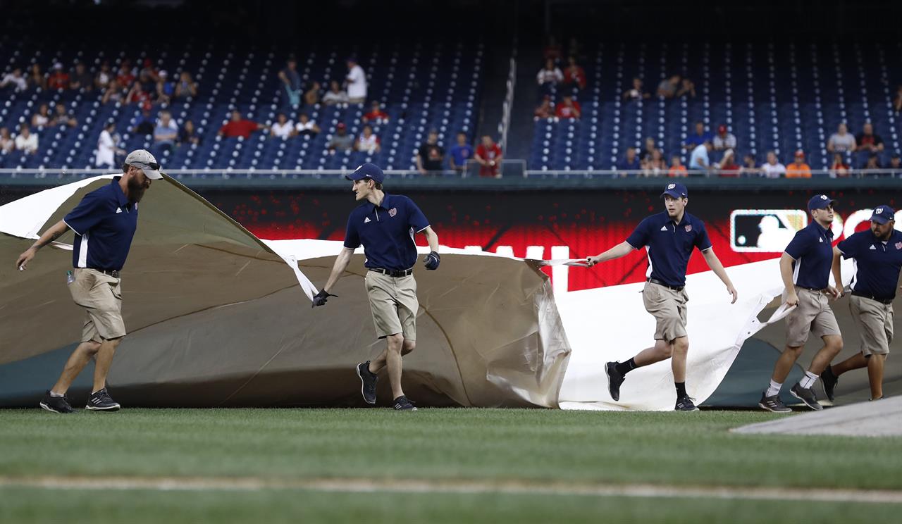 Giants-Nationals game postponed after lengthy rain delay - Houston, TX Giants-Nationals game postponed after lengthy rain delay - Houston, TX